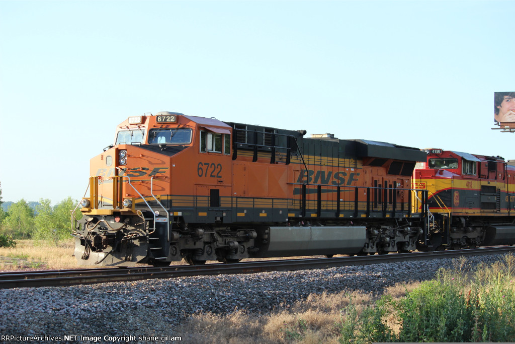 BNSF 6722 is tied down on the siding due to track work.